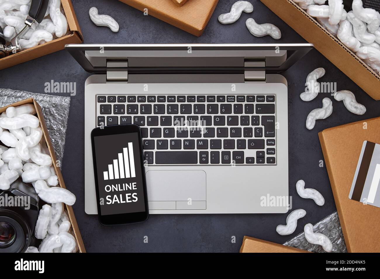 Online sales growth concept. Laptop computer and smartphone with online ...