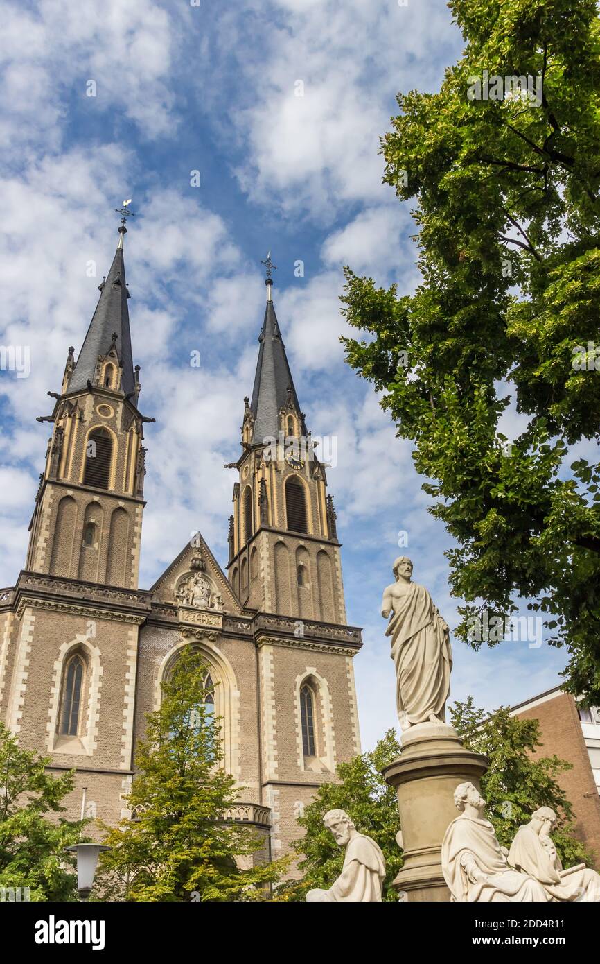 Statue in front of the Stiftskirche church in Bonn, Germany Stock Photo ...