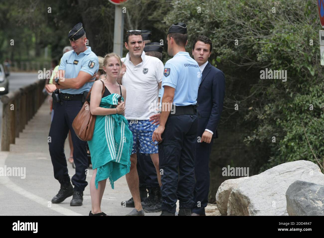 Security as French President Emmanuel Macron's convoy arriving at his ...