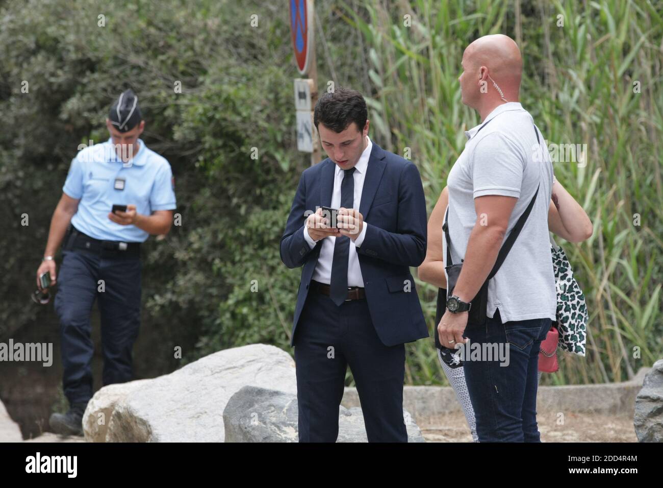 Security as French President Emmanuel Macron's convoy arriving at his ...