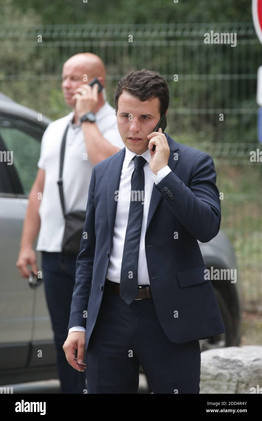 Security as French President Emmanuel Macron's convoy arriving at his ...