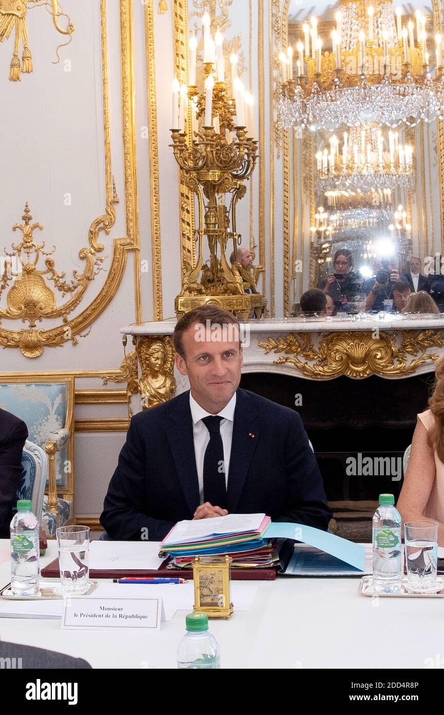 French President Emmanuel Macron leads the last cabinet meeting before ...