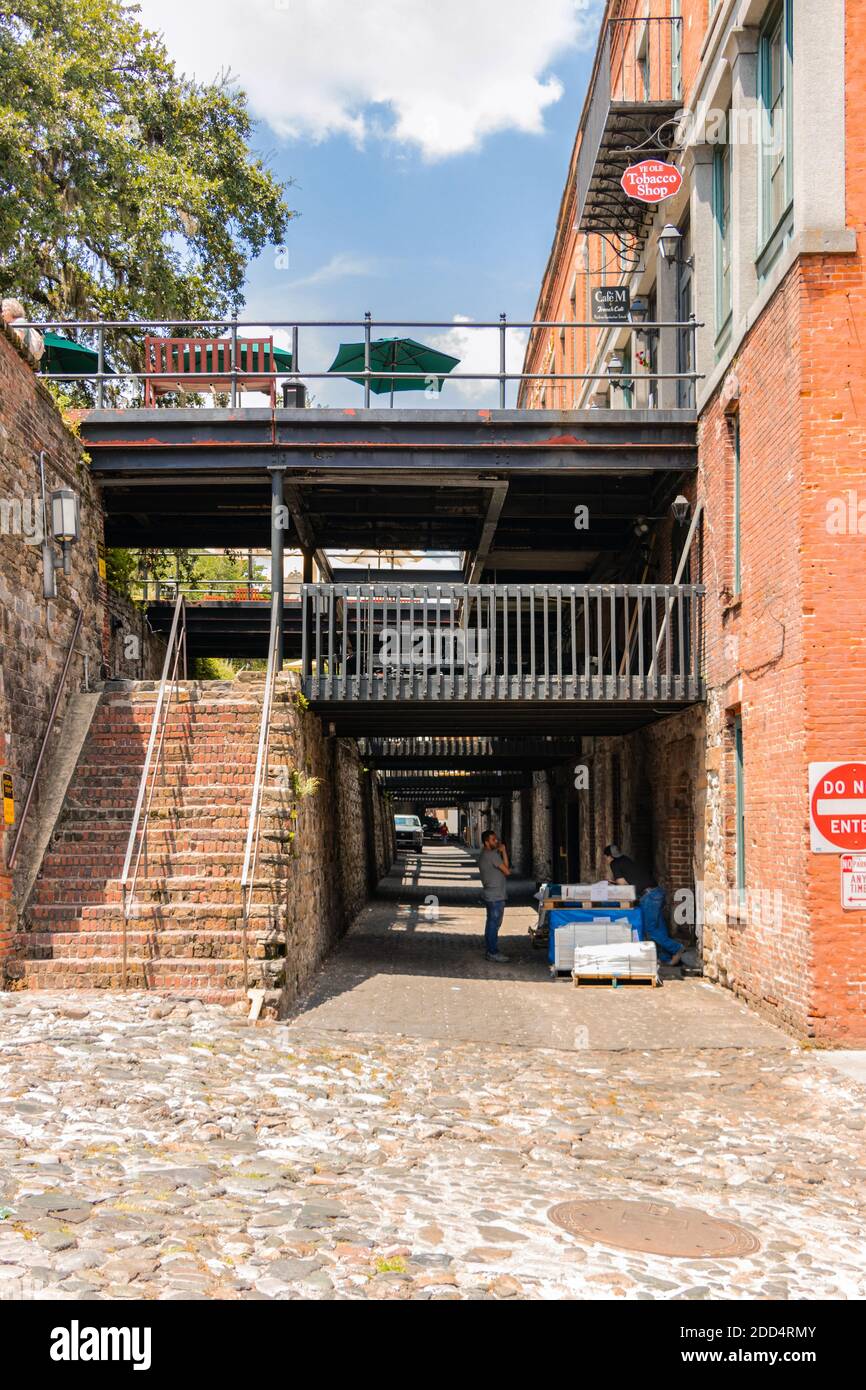 workers deliver pallets in undercroft of victorian building s in ...
