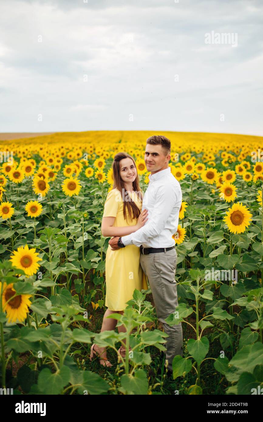 Happy family hugs in sun hi-res stock photography and images - Alamy