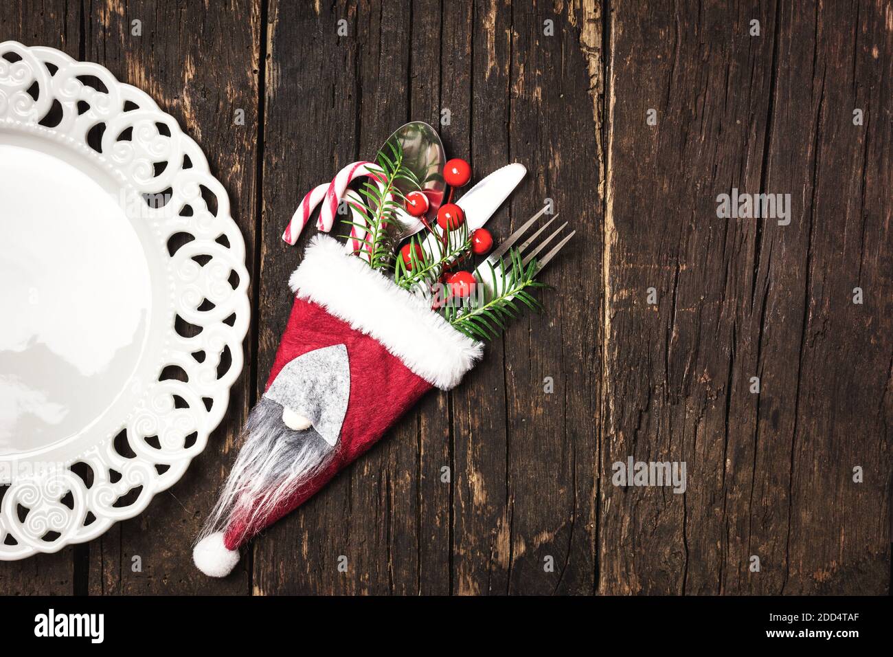 Christmas table place setting with Christmas decorations, top view with ...