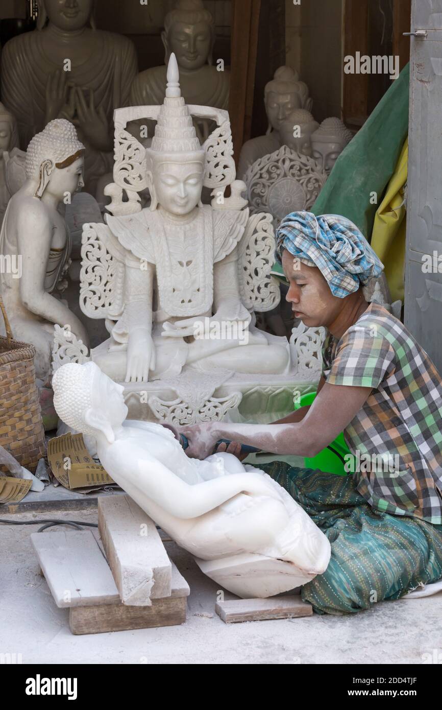 Local woman sculpting a marble Buddha, Amarapura, Mandalay, Myanmar ...