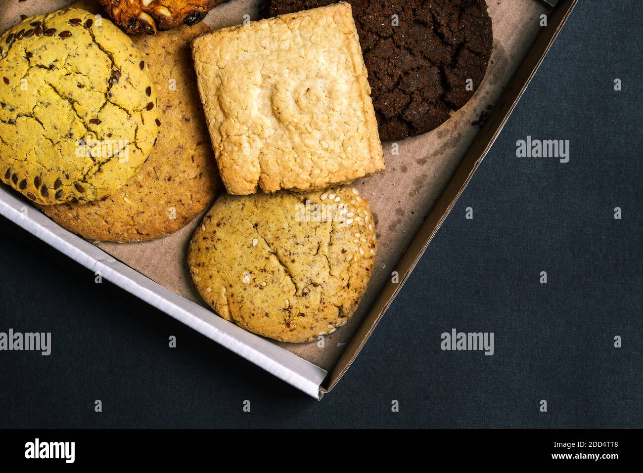 Cardboard box with homemade cookies. Festive cookies in a box. A sweet ...