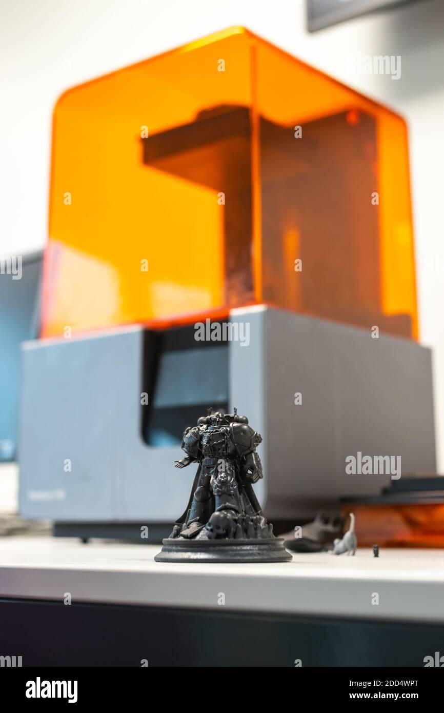 fantasy figurine in front of Formlabs SLA 3D printer rapid prototyped plastic parts Stock Photo ...