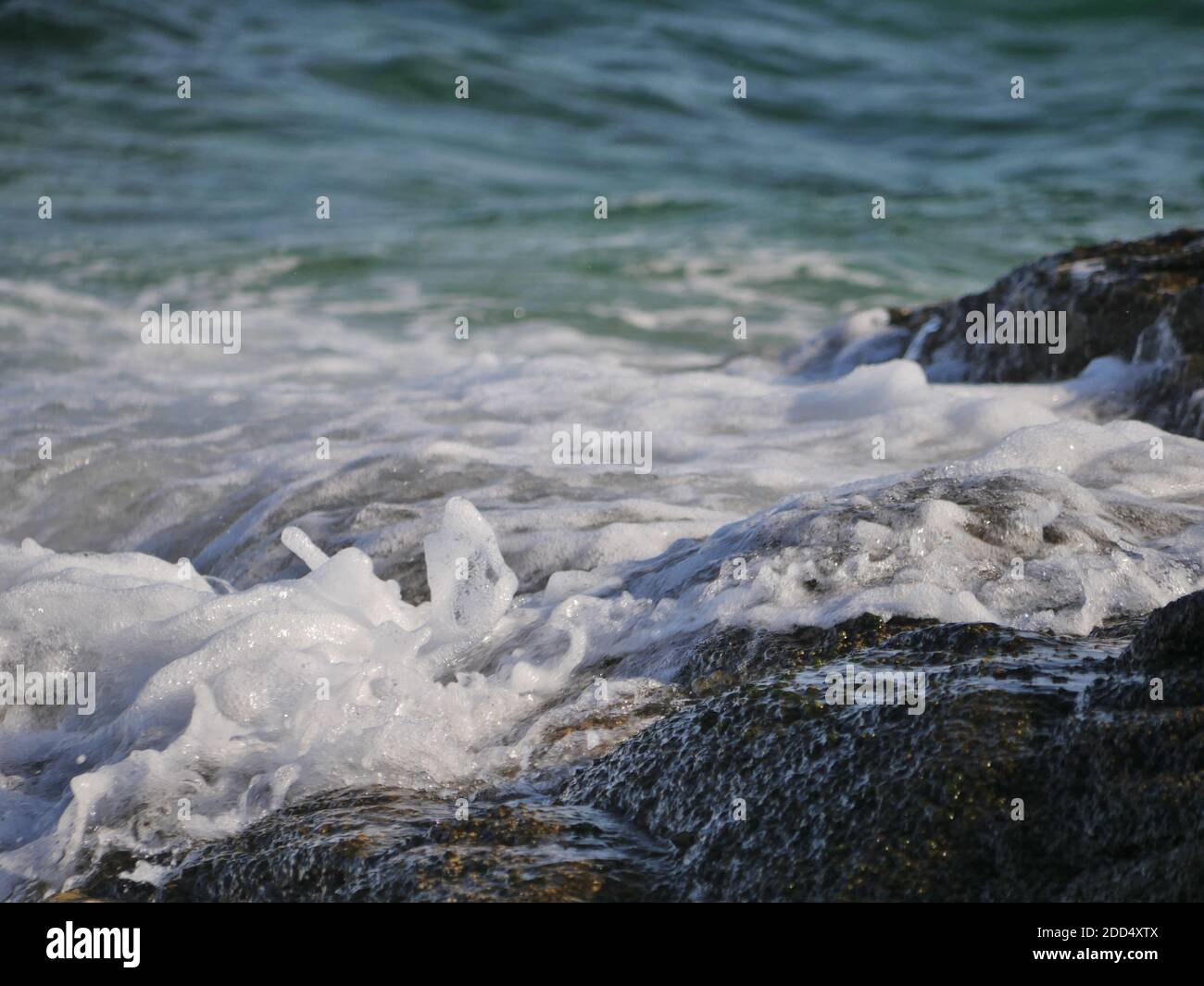Wave crashing against rocks cliff hi-res stock photography and images ...