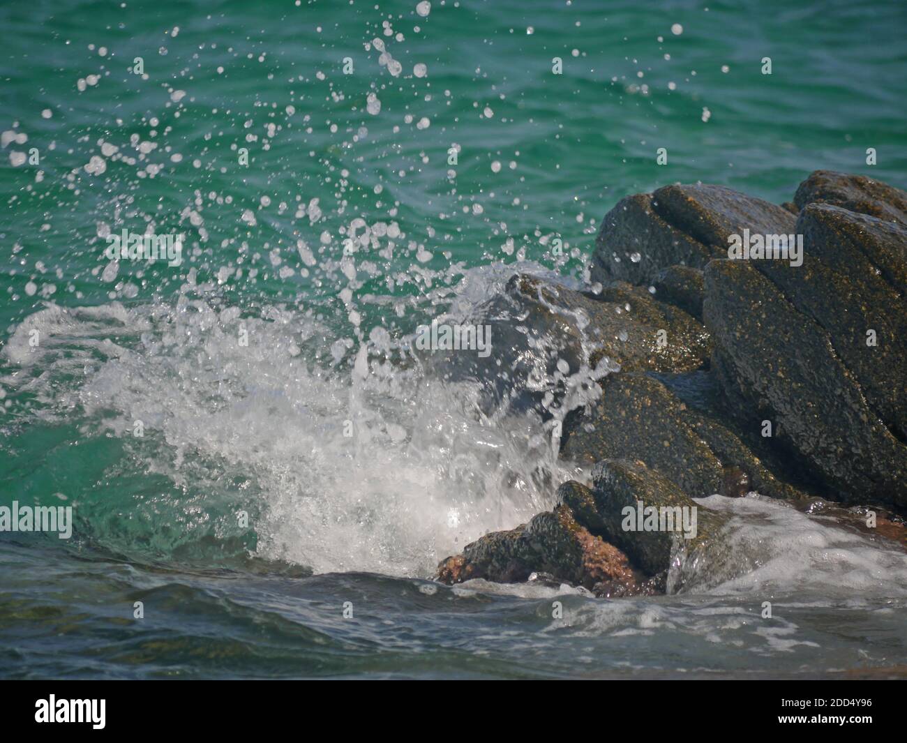 Wave crashing against rocks cliff hi-res stock photography and images ...