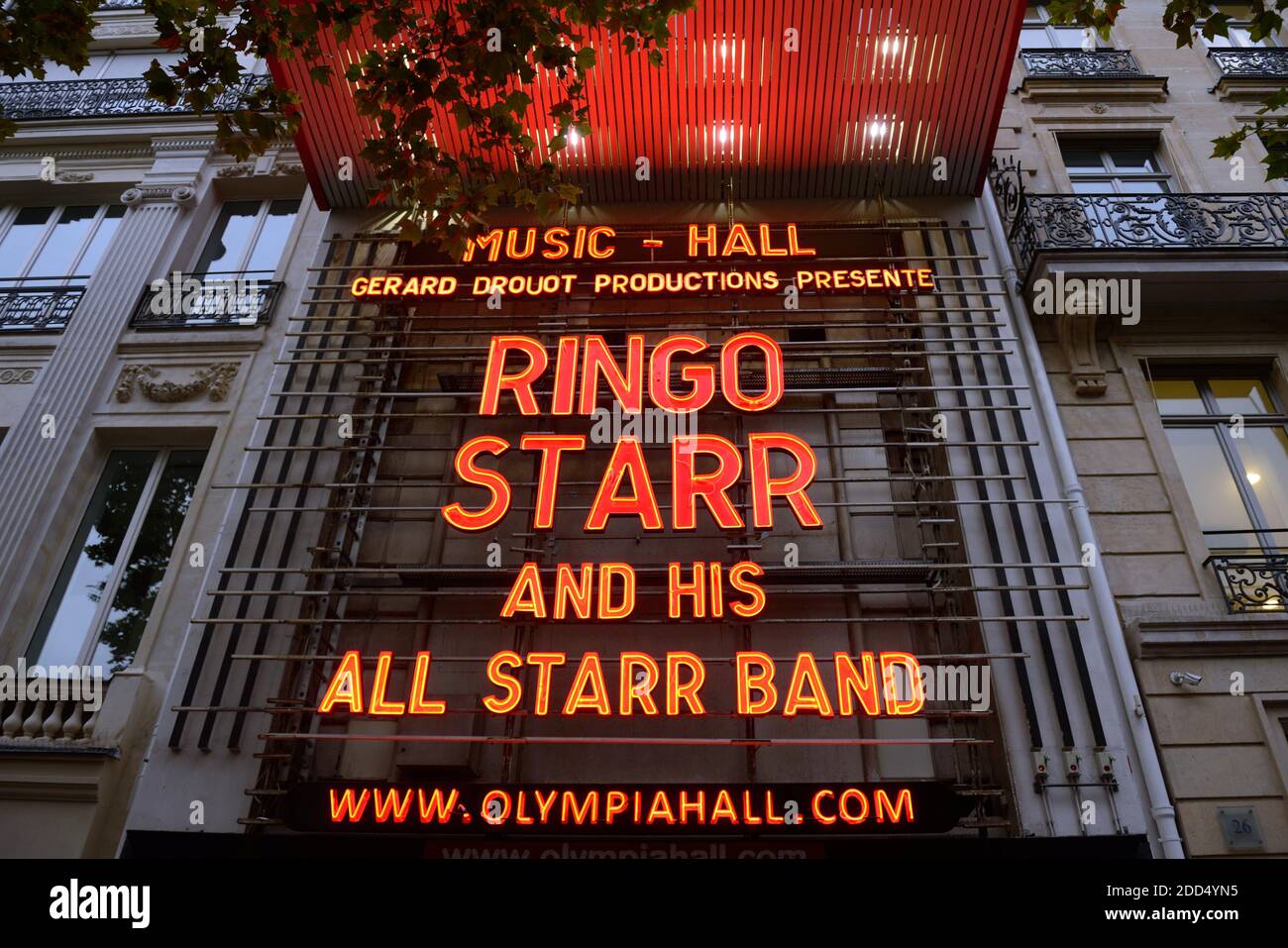 Ringo Starr written in neon letters in front of the theater where Ringo ...
