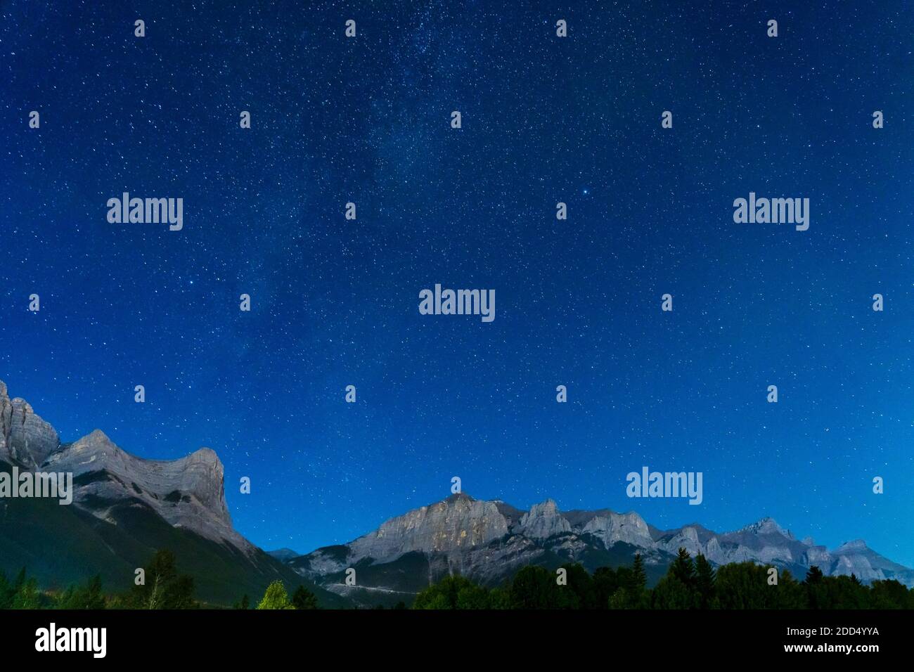 Starry sky with Rocky Mountains Mount Rundle in summer night Stock ...