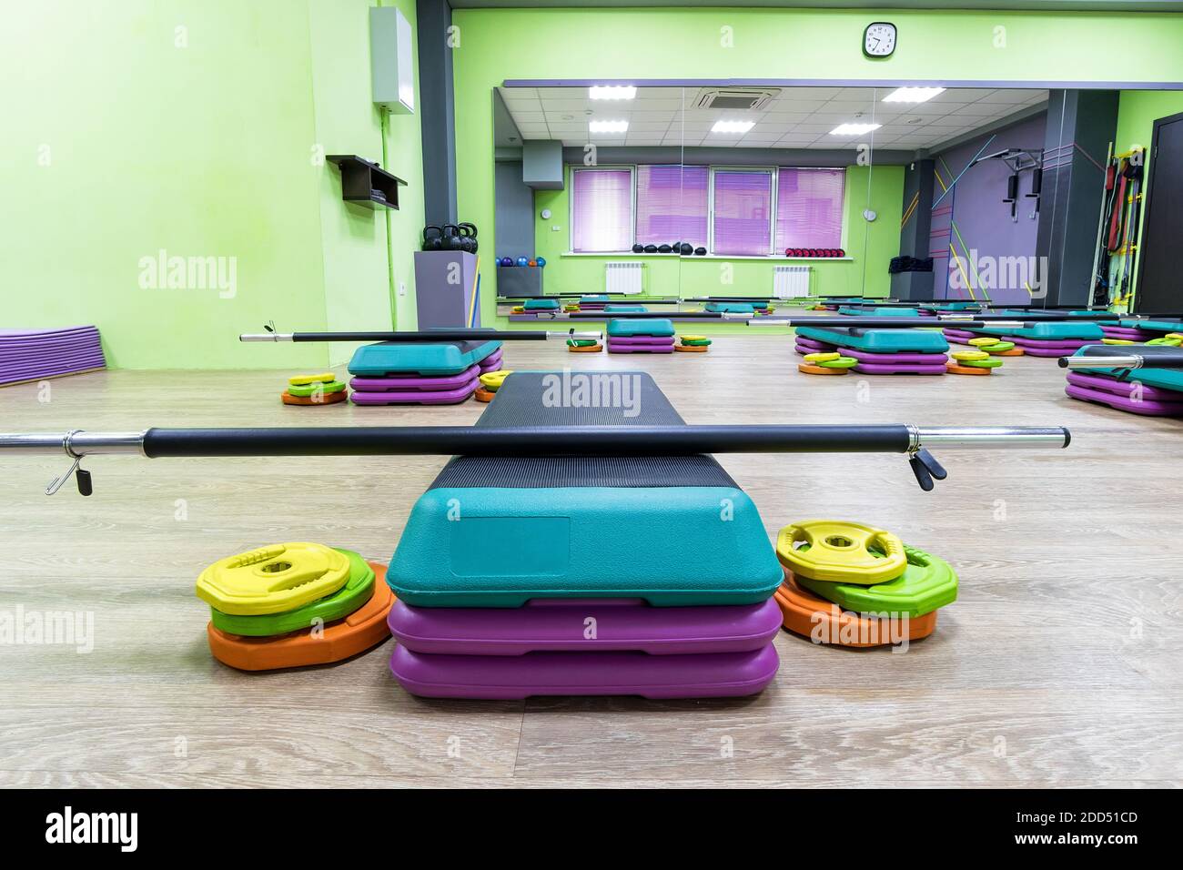 interior of a gym fitness room for training with equipment step-by-step ...