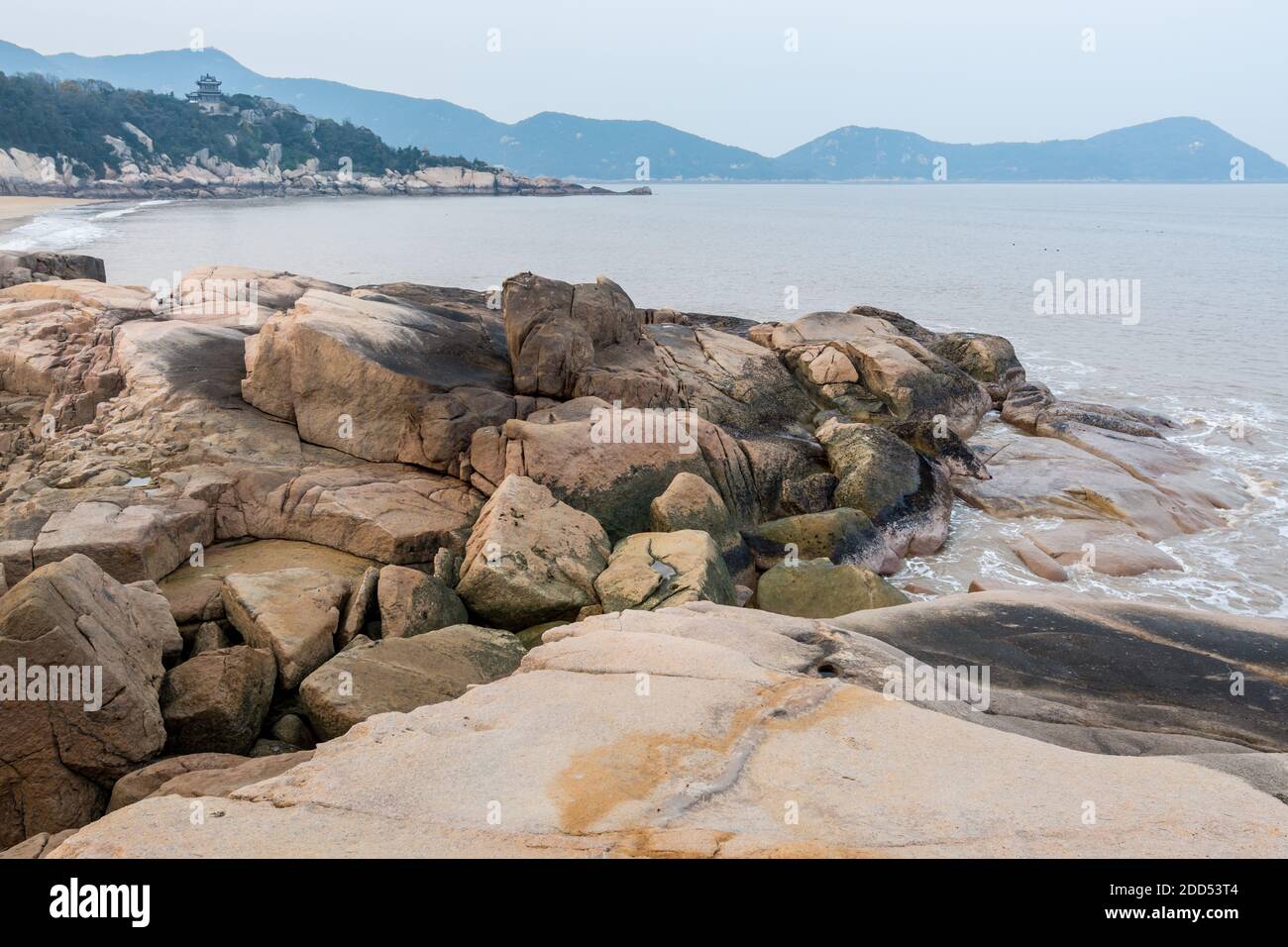 Rocky coastline and rocks and beach in the Putuoshan, Zhoushan Islands ...