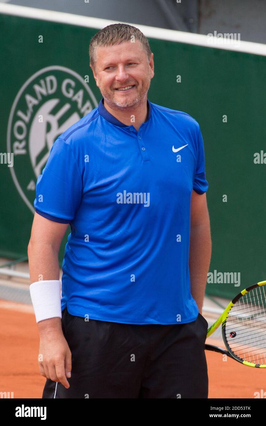 Yevgeny Kafelnikov in action during French Tennis Open at Roland-Garros ...