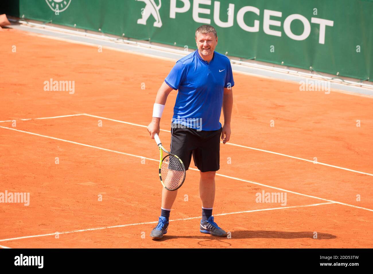 Yevgeny Kafelnikov in action during French Tennis Open at Roland-Garros ...