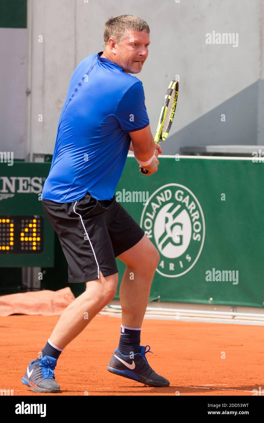 Yevgeny Kafelnikov in action during French Tennis Open at Roland-Garros ...