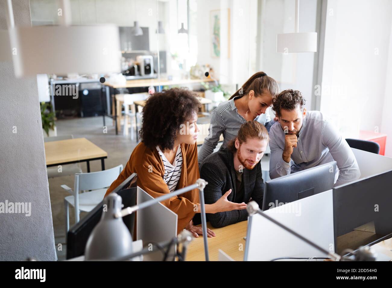 Programmer working in a software developing company Stock Photo - Alamy