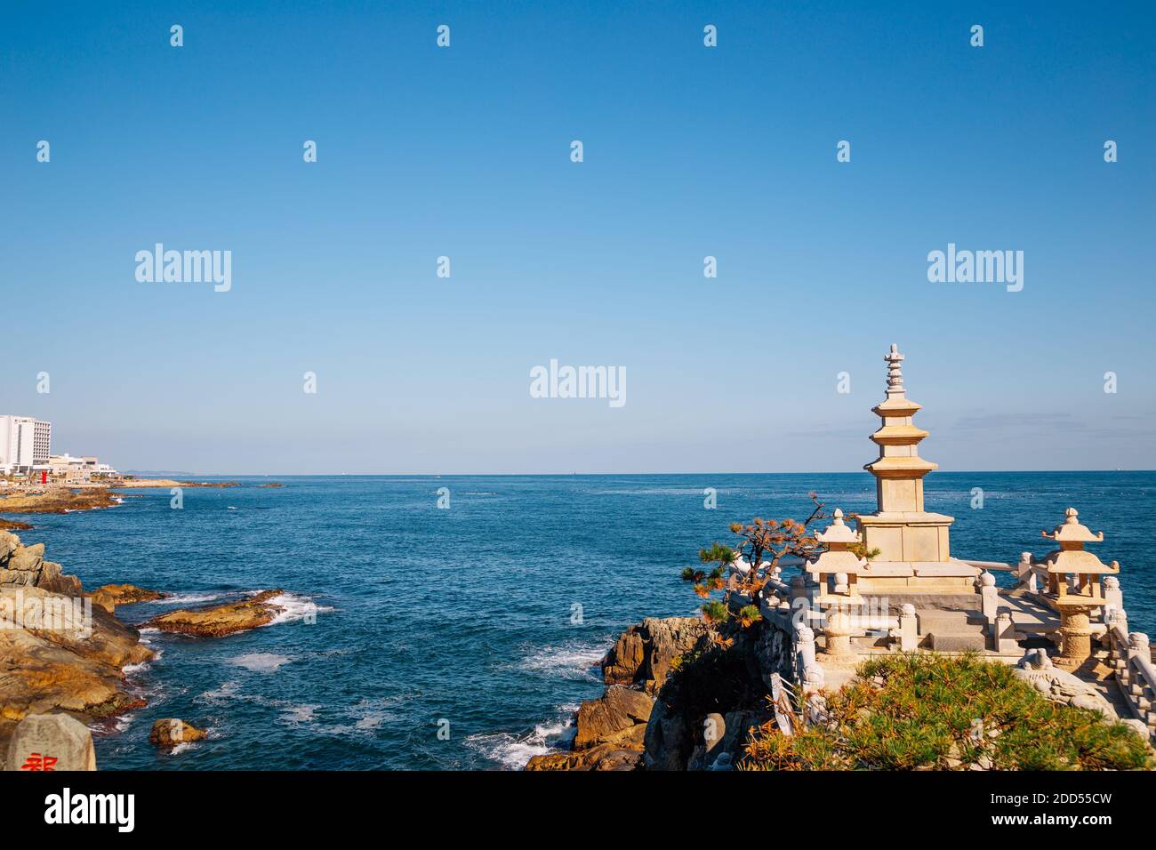 Stone tower with blue ocean at Haedong Yonggungsa Temple in Busan ...