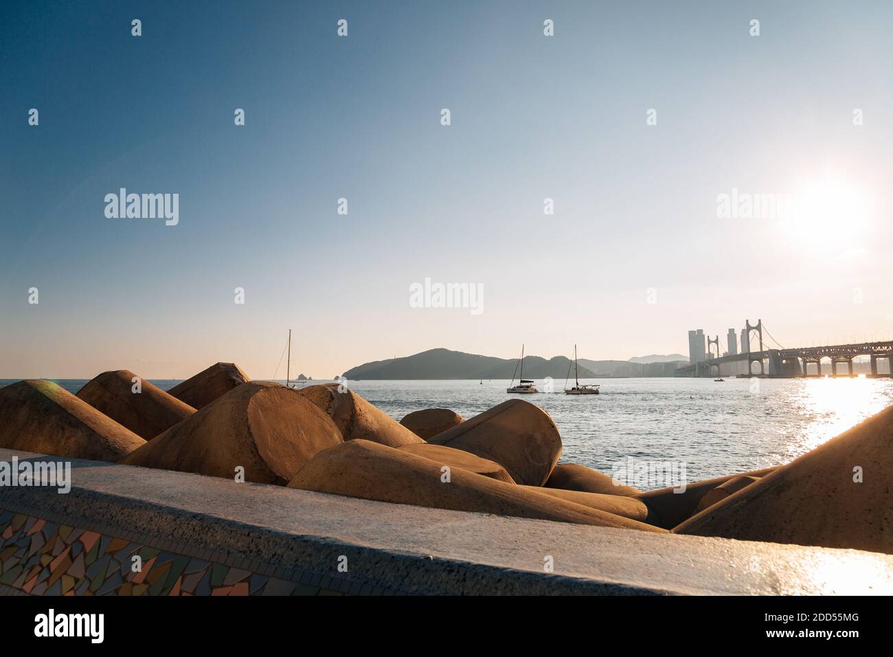 Sunset of Gwangan bridge and Haeundae blue ocean in Busan, Korea Stock ...