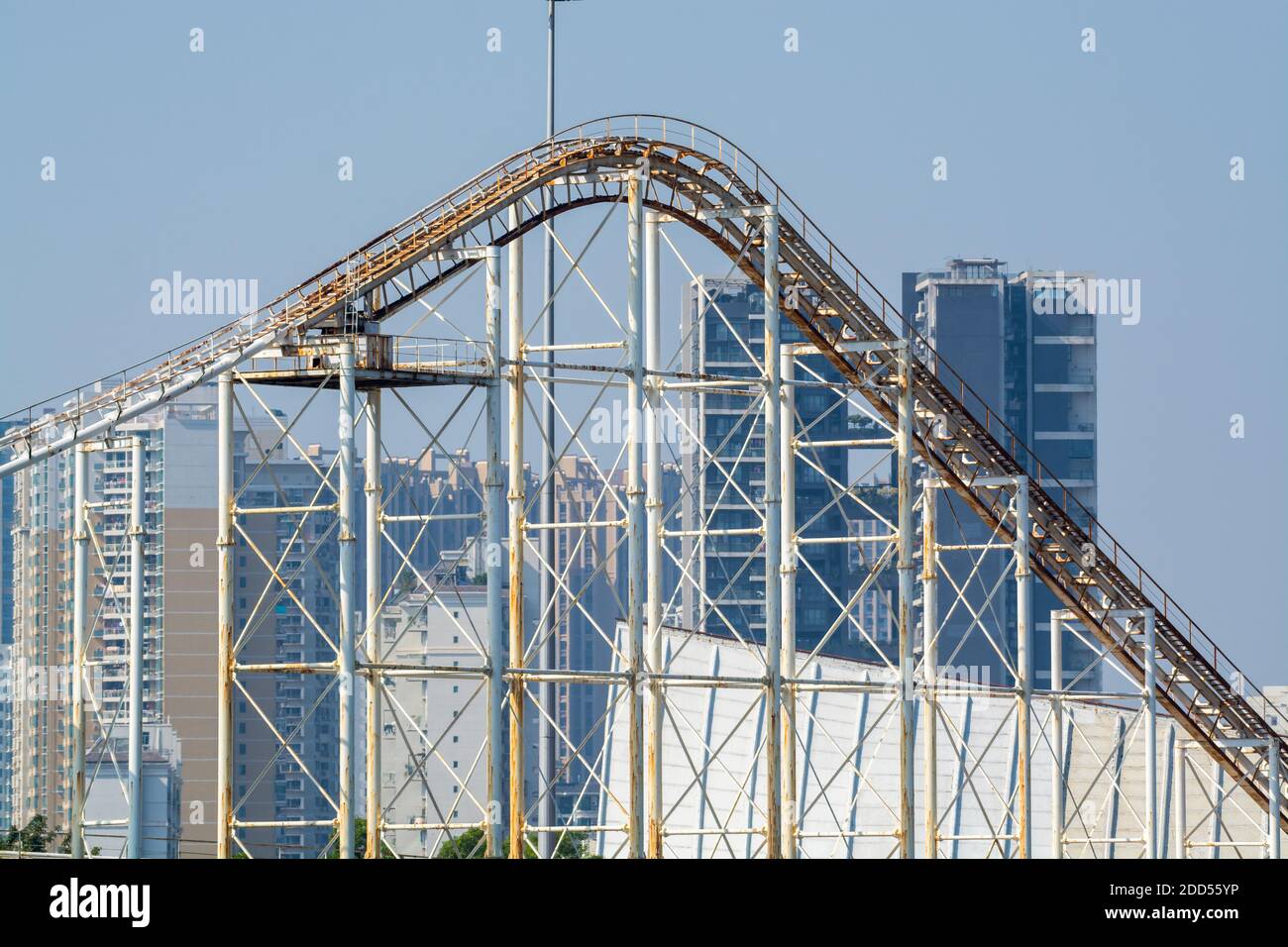 Steel tracks of Roller Coaster with background of skylines Stock Photo ...
