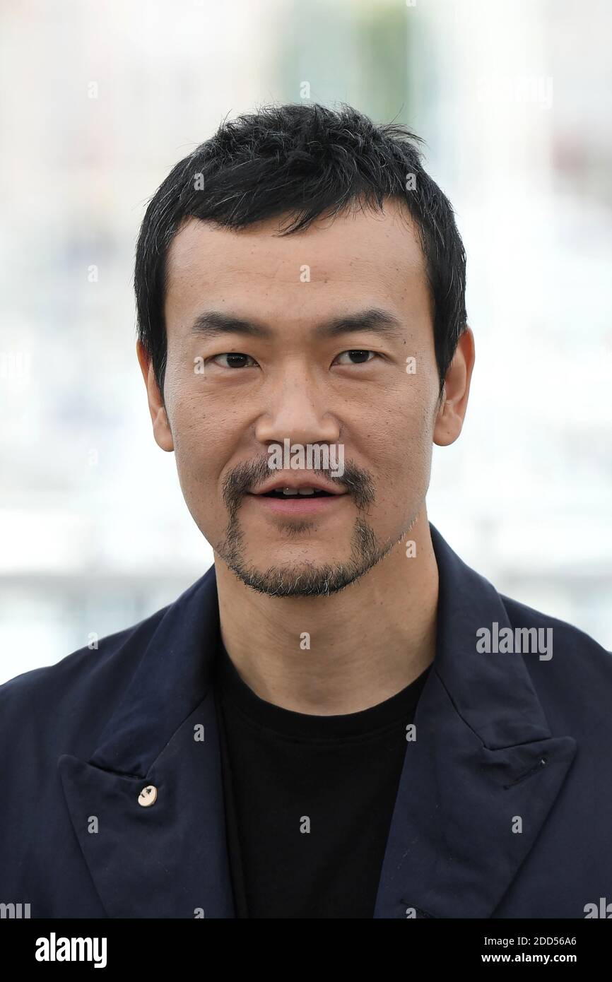 Fan Liao posing at the Les Eternels photocall held at the Palais des ...