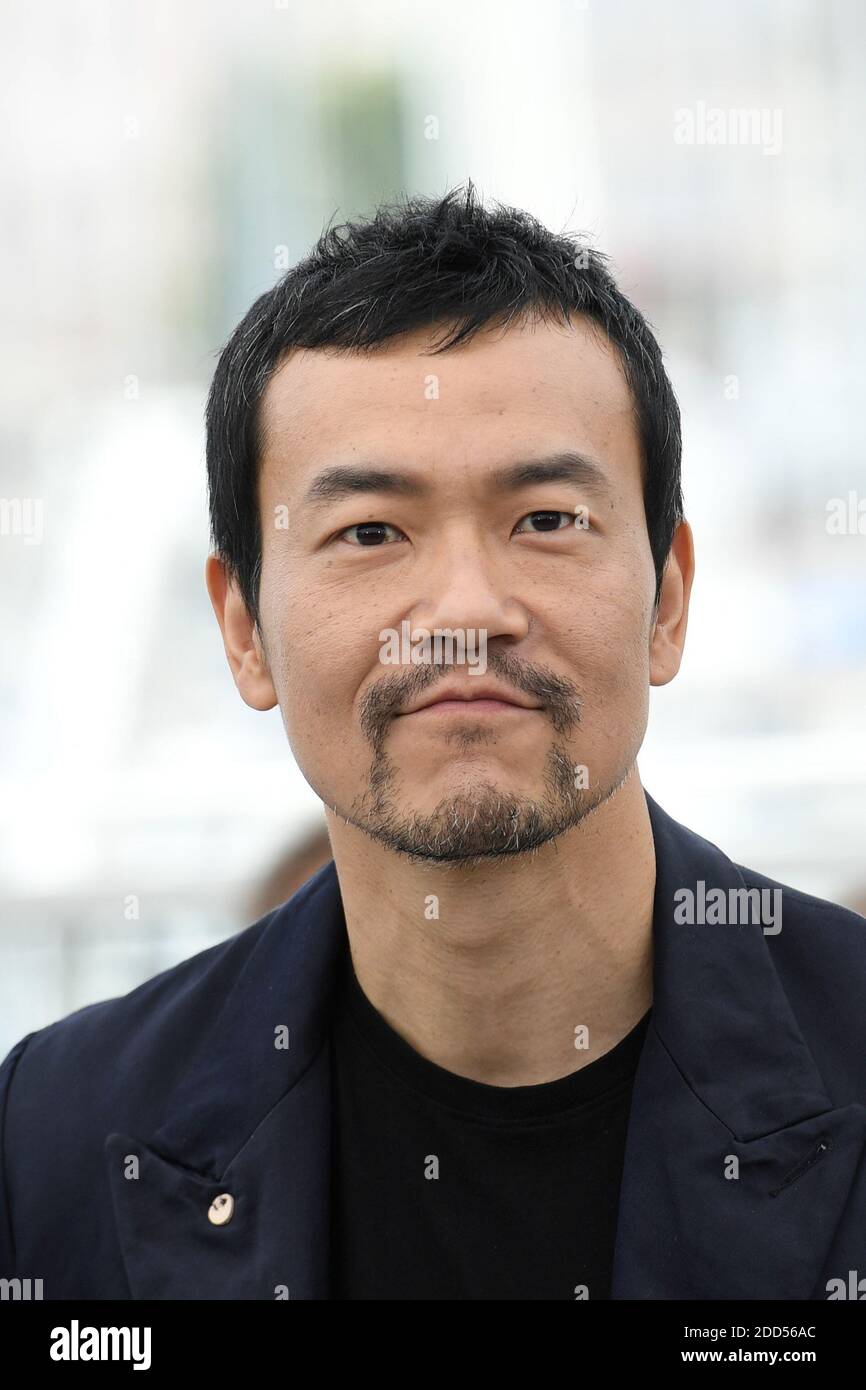 Fan Liao posing at the Les Eternels photocall held at the Palais des ...