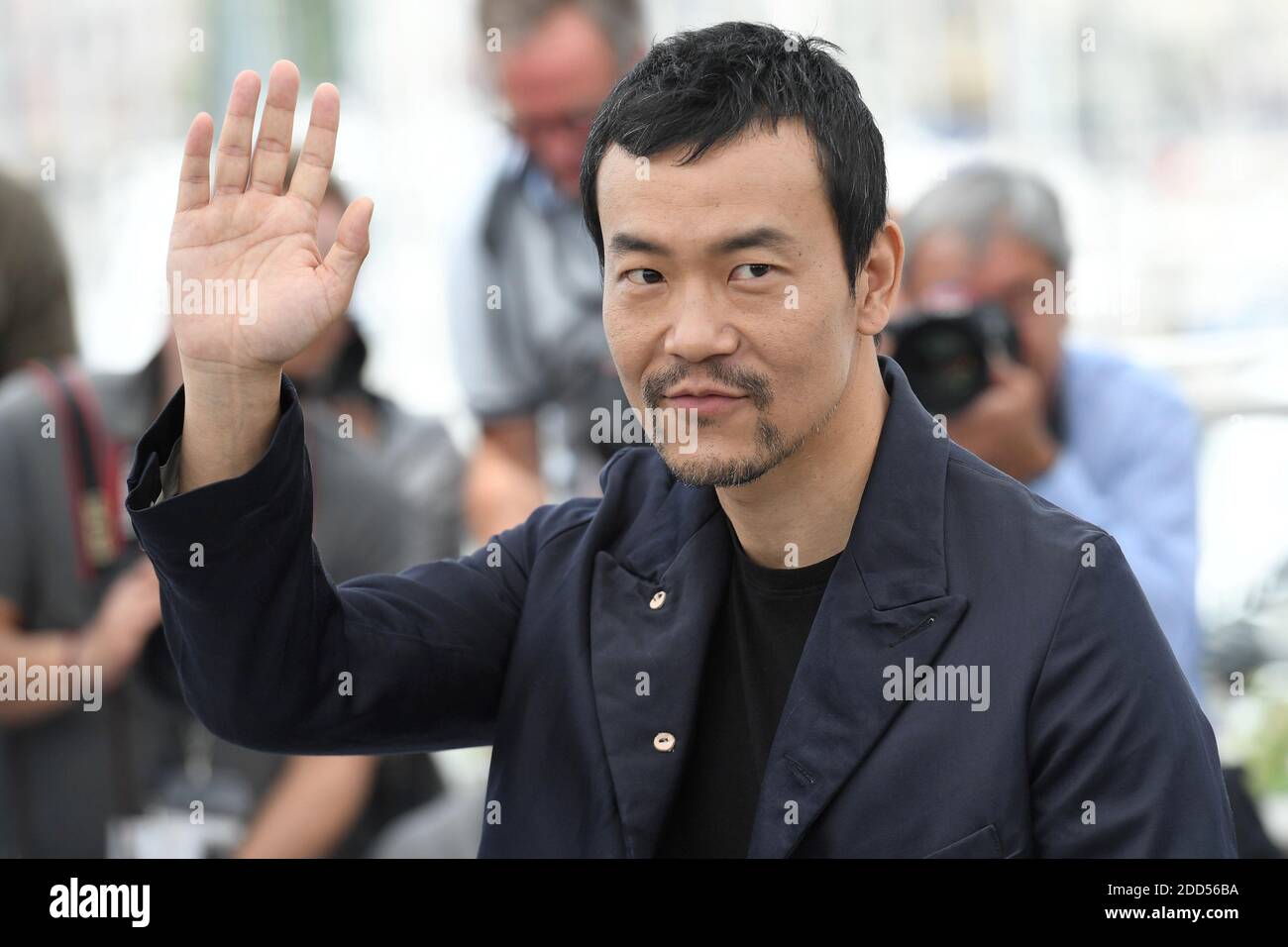 Fan Liao posing at the Les Eternels photocall held at the Palais des ...