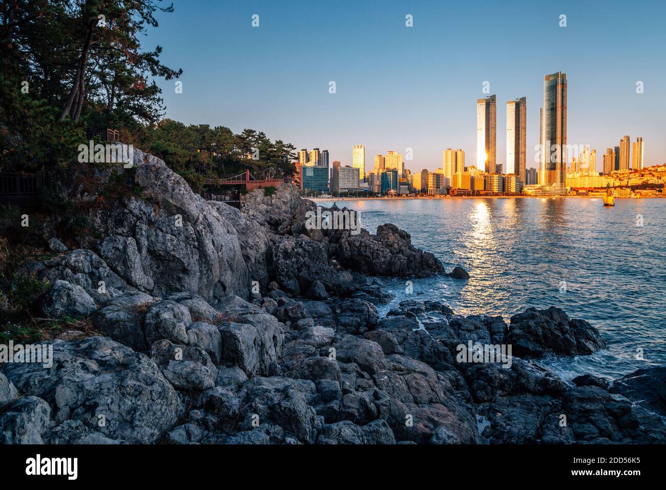 Haeundae beach and Dongbaekseom island at sunset in Busan, Korea Stock ...