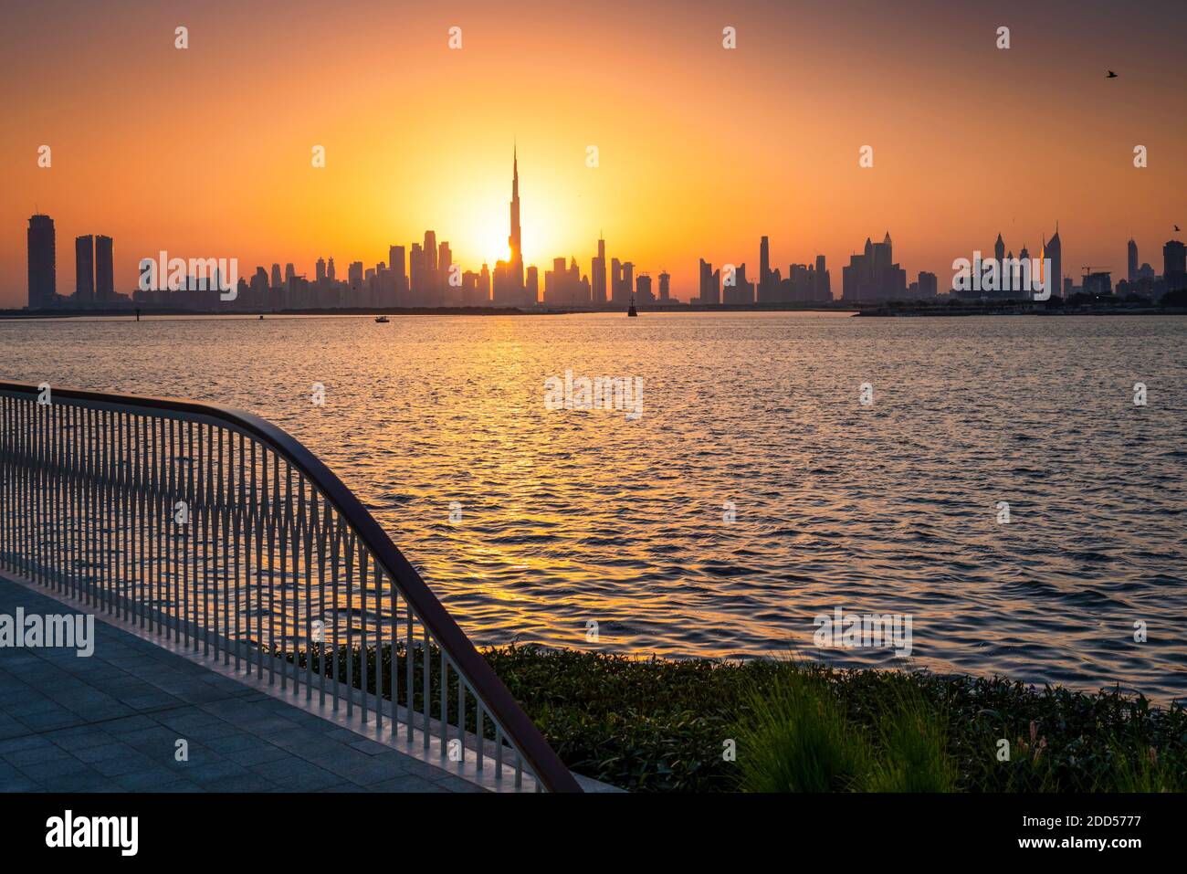 Beautiful sunset in Dubai from the creek harbor in the UAE Stock Photo ...