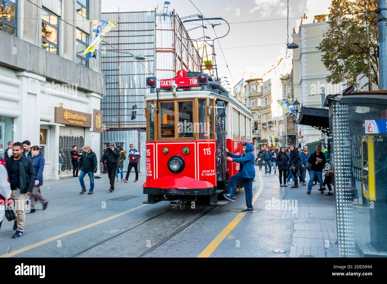 Red tram in the Taksim Istiklal Street, which is a popular destination ...