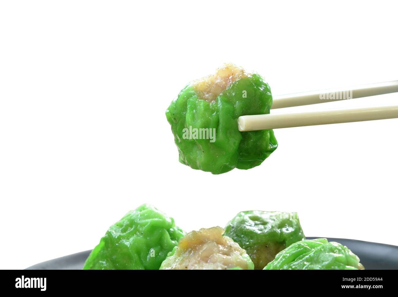 steamed Chinese jade dumpling filling minced shrimp or dim sum picking ...