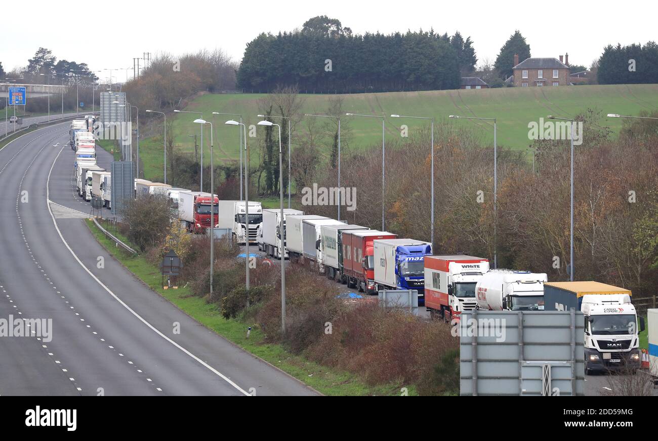 Freight lorries queueing along the M20 in Kent waiting to access the ...