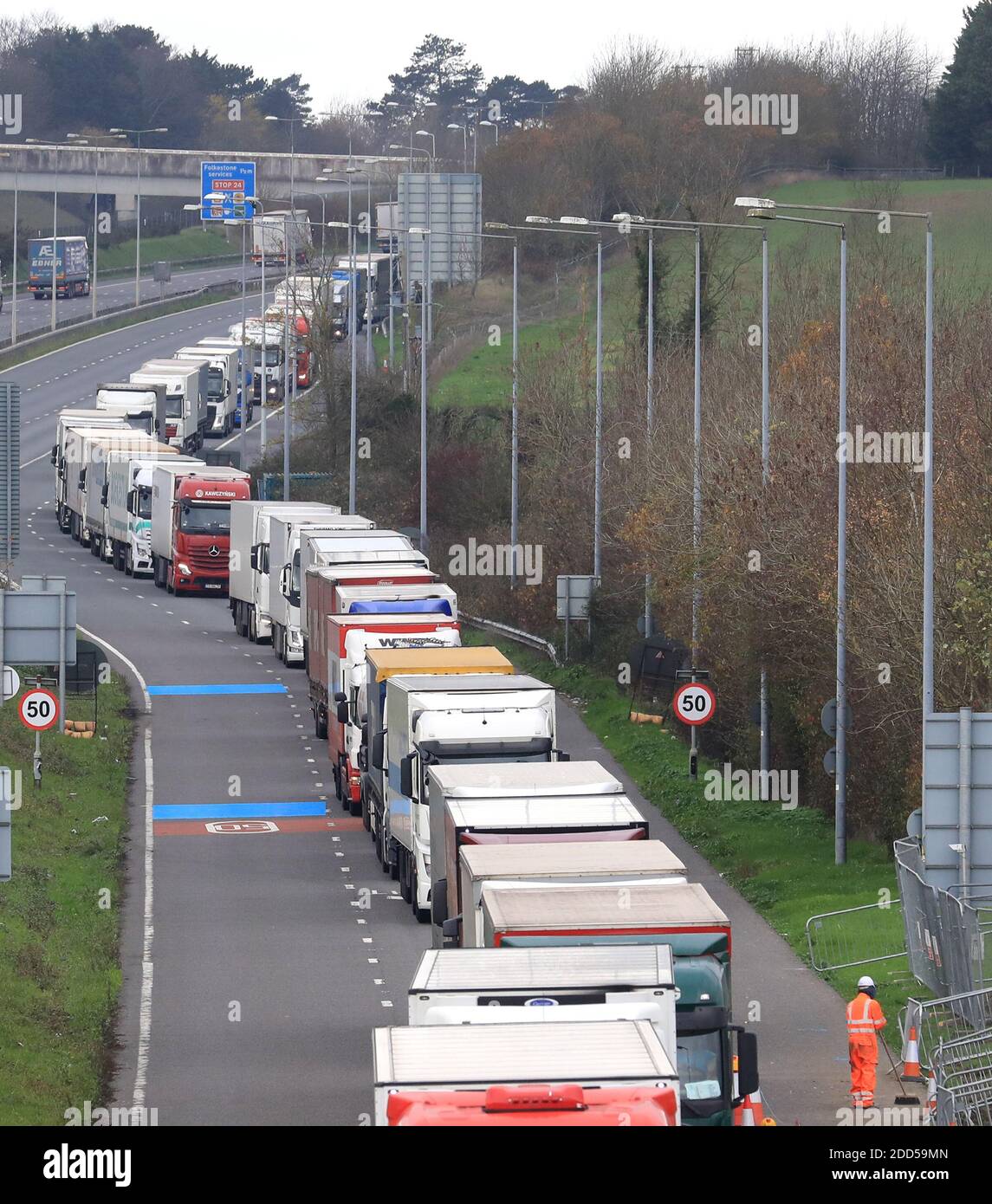 Freight lorries queueing along the M20 in Kent waiting to access the ...