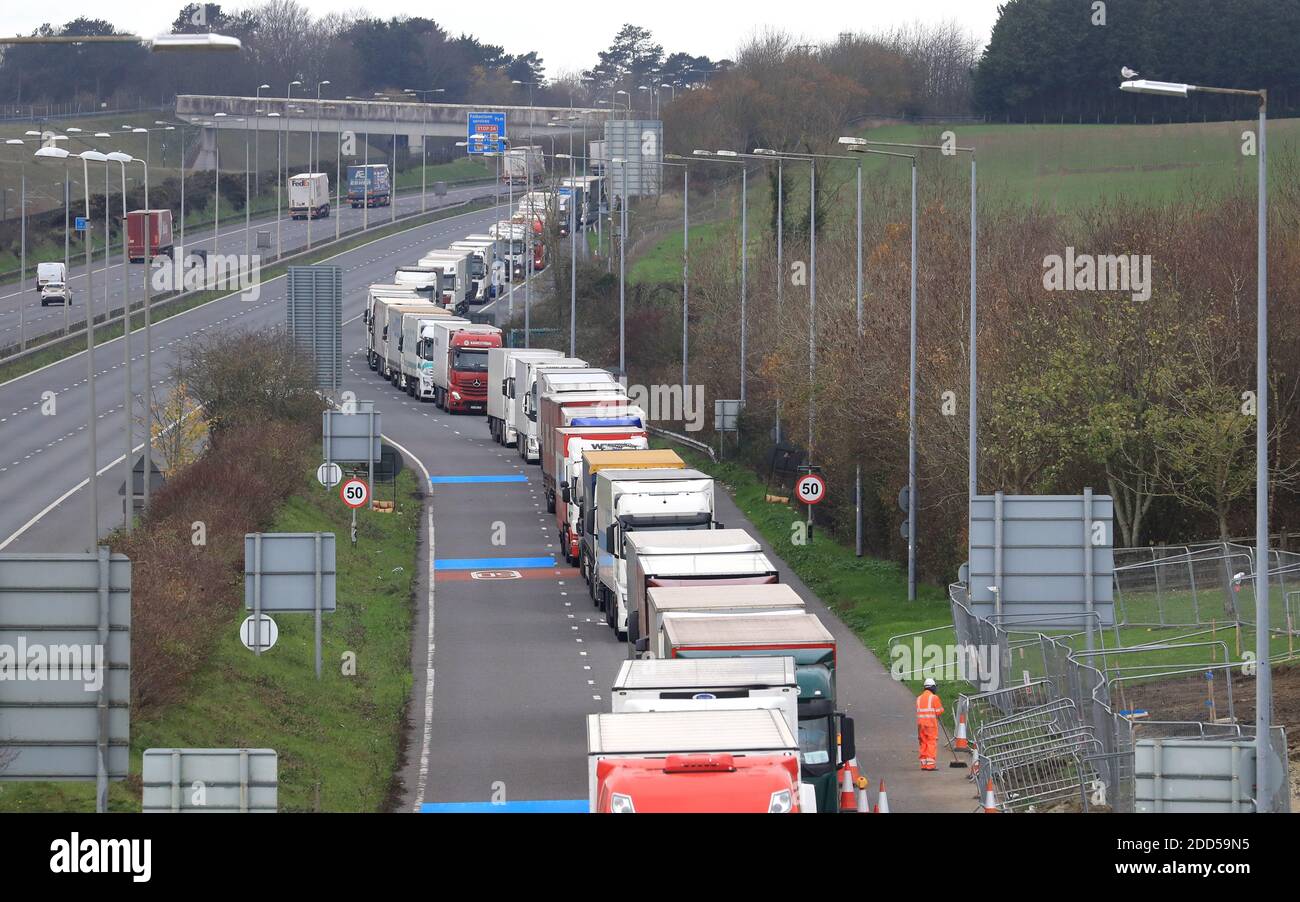 Freight lorries queueing along the M20 in Kent waiting to access the ...