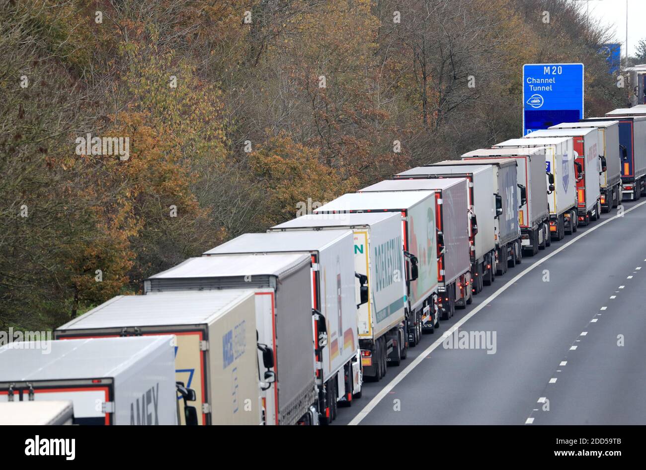 Freight lorries queueing along the M20 in Kent waiting to access the ...