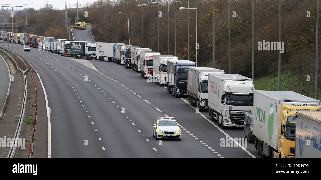 Freight lorries queueing along the M20 in Kent waiting to access the ...