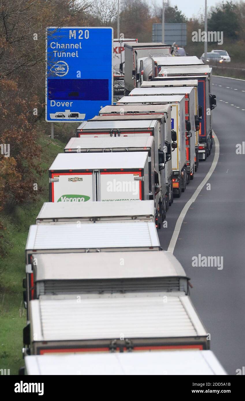 Freight lorries queueing along the M20 in Kent waiting to access the ...
