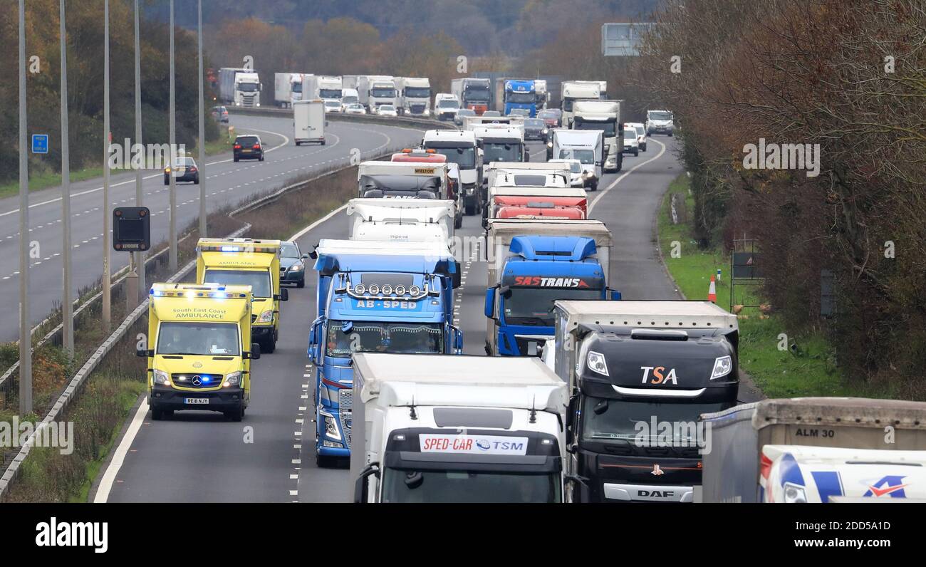 Freight lorries queueing along the M20 in Kent waiting to access the ...