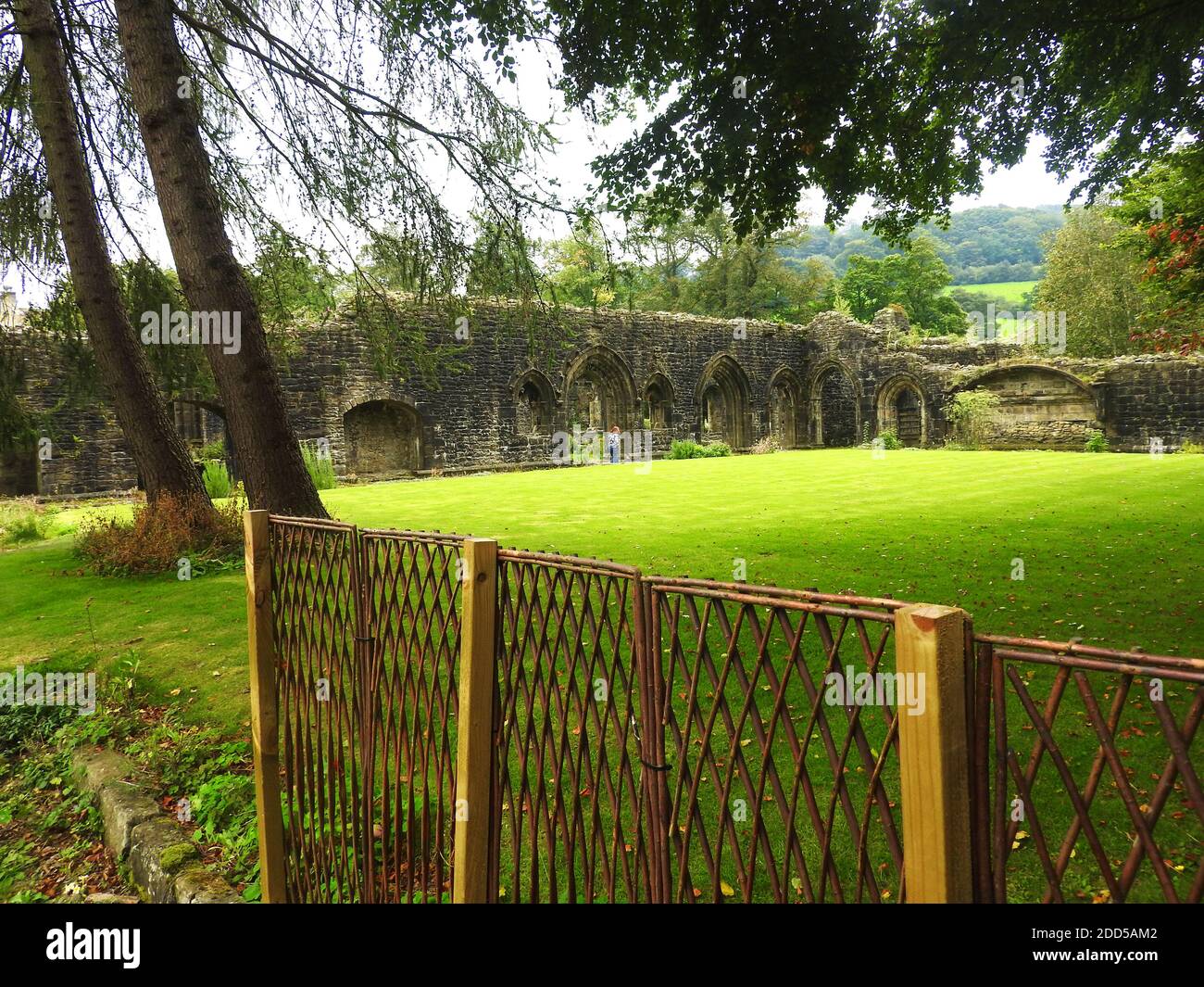 A traditional woven wicker hurdle fence at Whalley Abbey , Lancashire ...