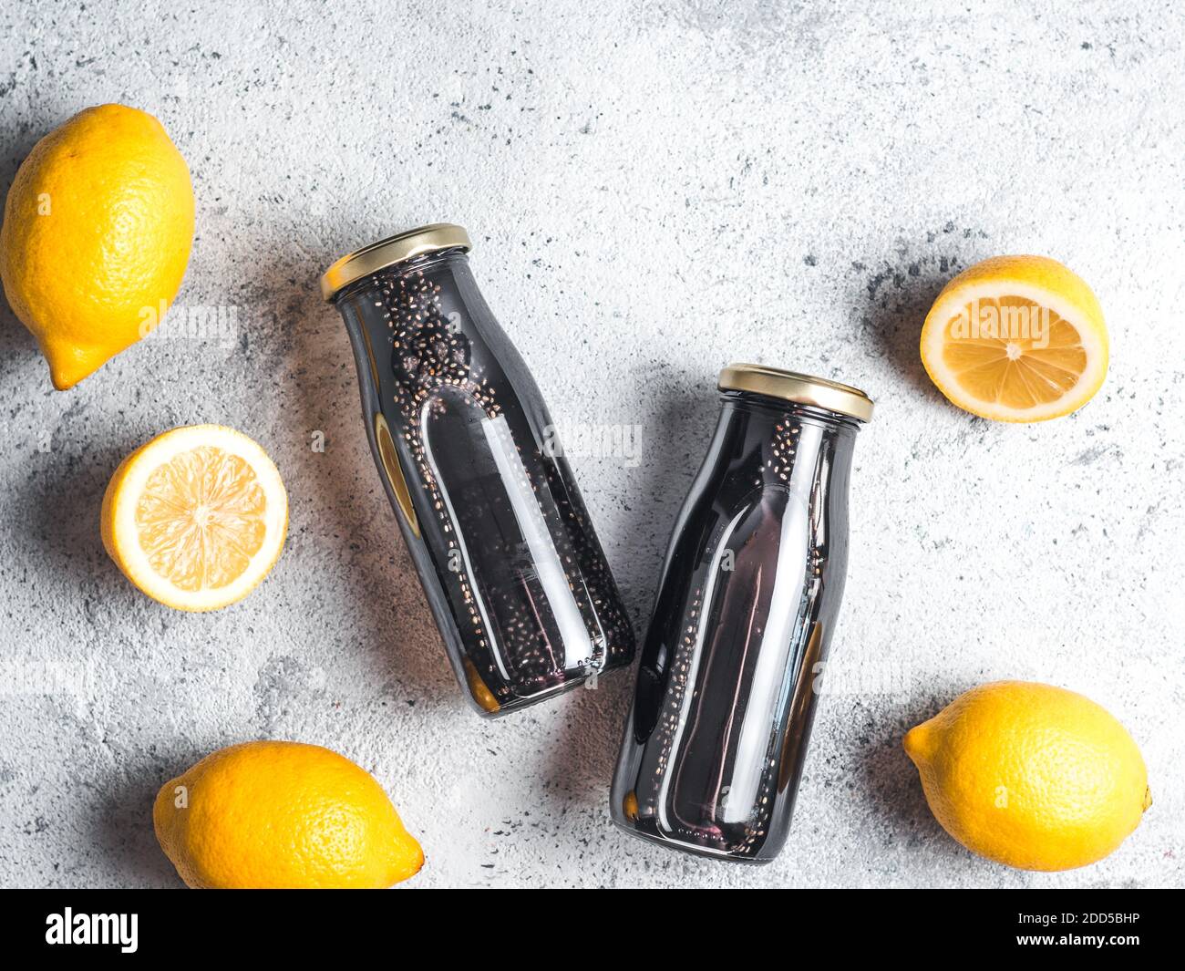Detox activated charcoal black chia water or lemonade with lemon. Two ...
