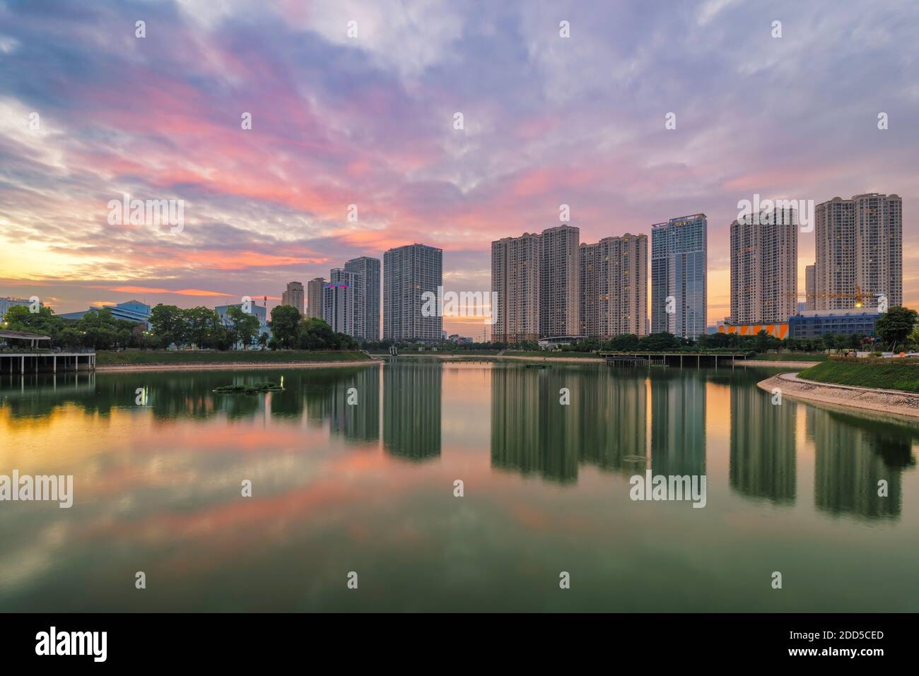 Cityscape of Hanoi skyline at Thanh Xuan park during sunset time in ...