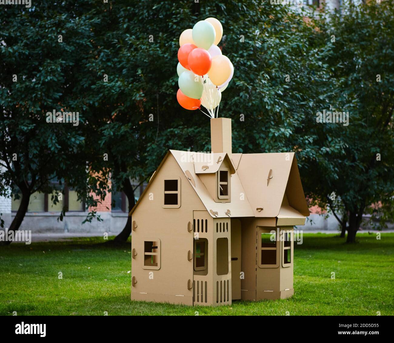 Cardboard playhouse in the backyard for kids. Eco concept Stock Photo ...
