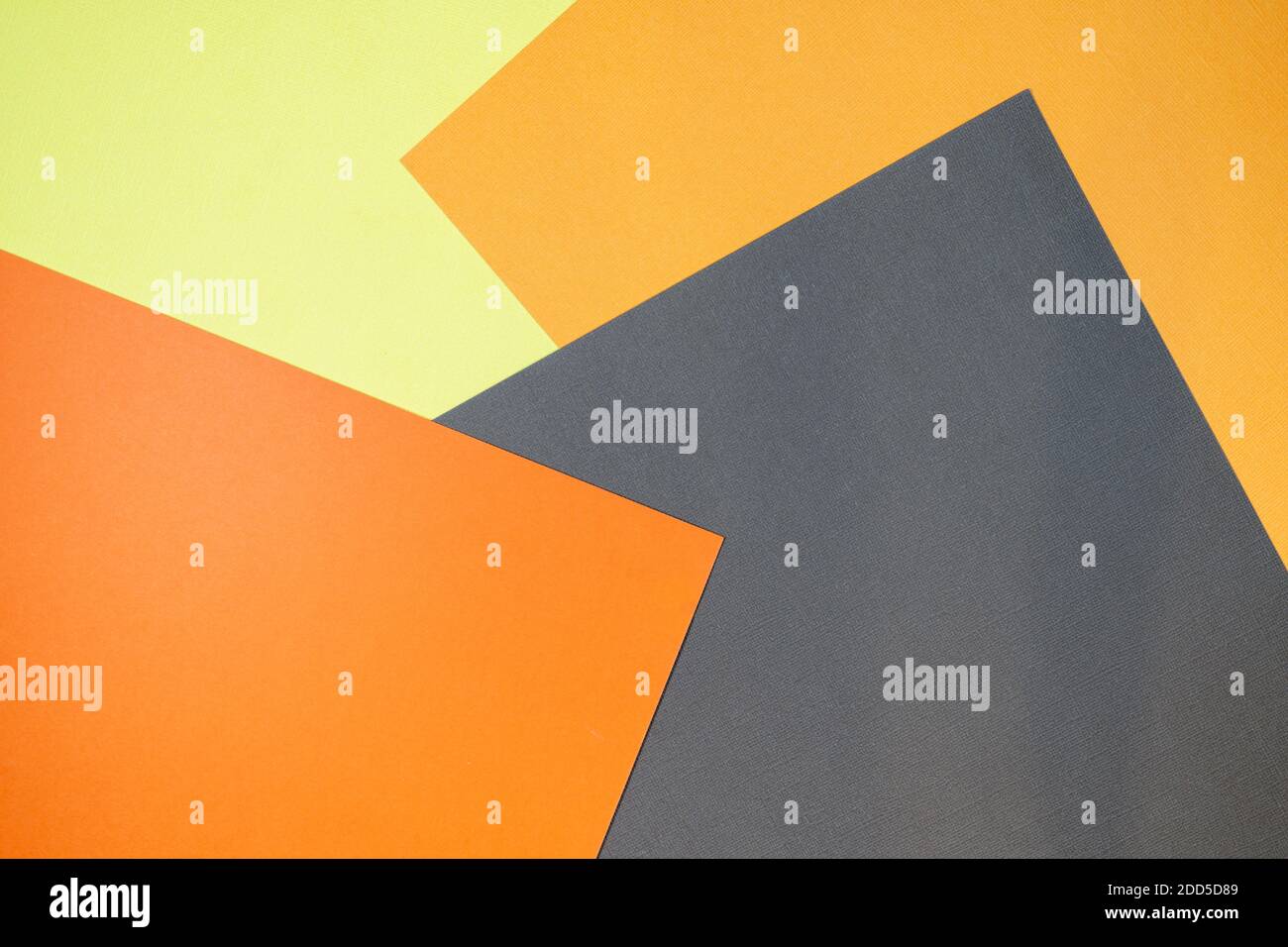 Multi colored abstract paper of pastel yellow, orange,brown colors ...