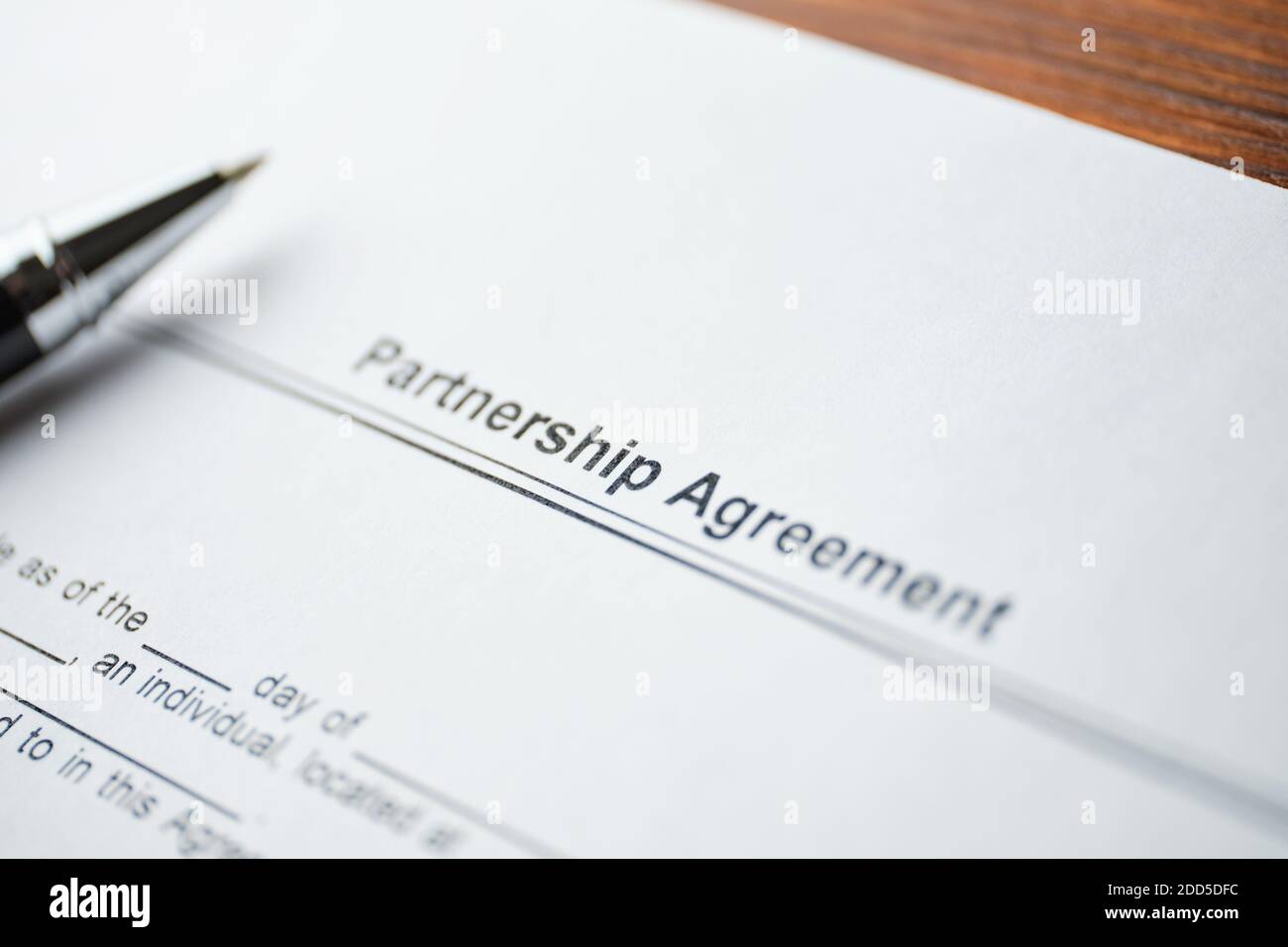 The document Partnership Agreement is ready for signing Stock Photo - Alamy