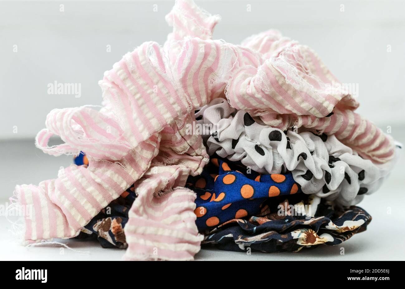 Cute colorful old rags like symbol of past Stock Photo - Alamy