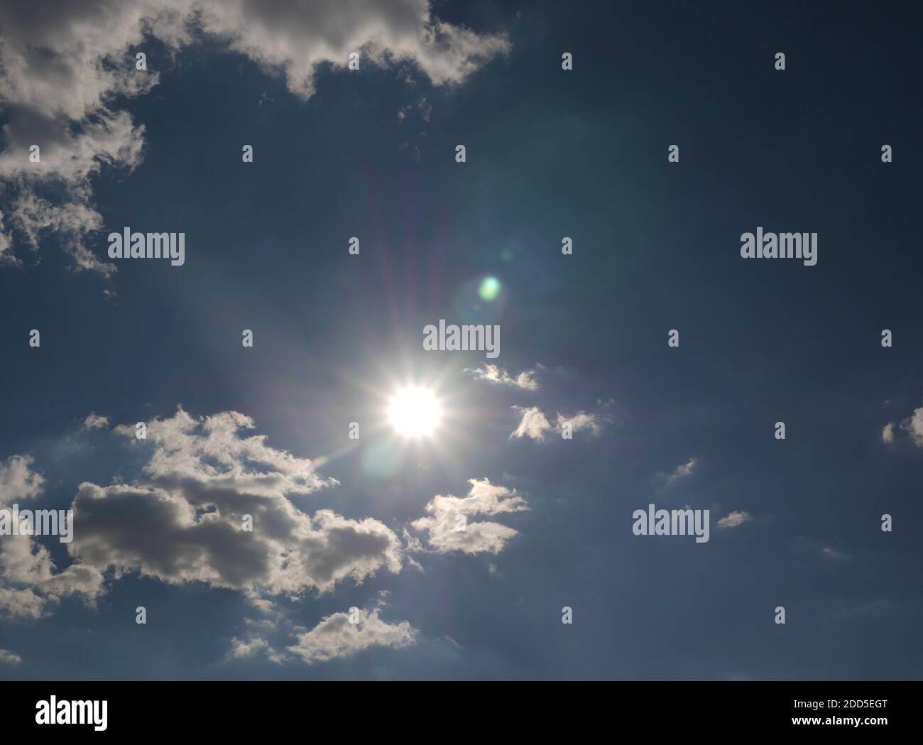 clouds blue sky sun ray, natural background Stock Photo - Alamy