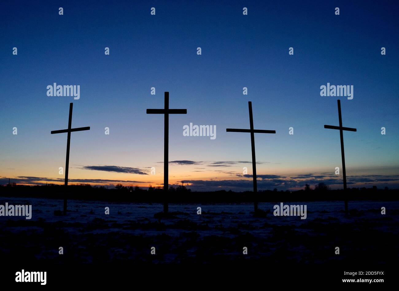 Silhouette the cross on sunset background Stock Photo - Alamy