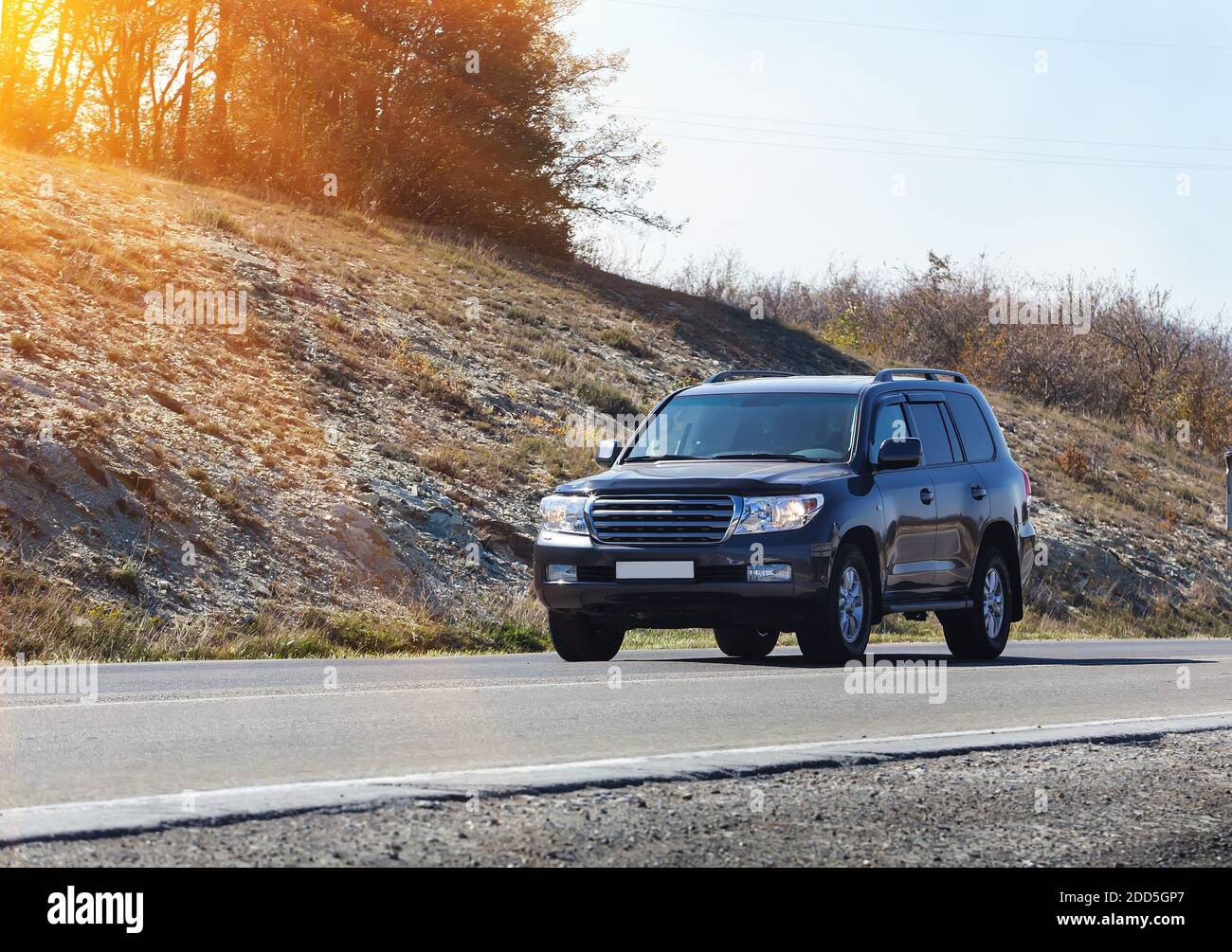 Car moving along forest hi-res stock photography and images - Alamy