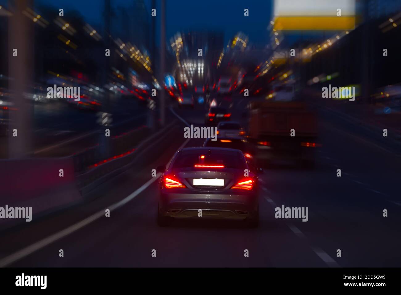 Car traffic at night on the avenue in the city Stock Photo - Alamy